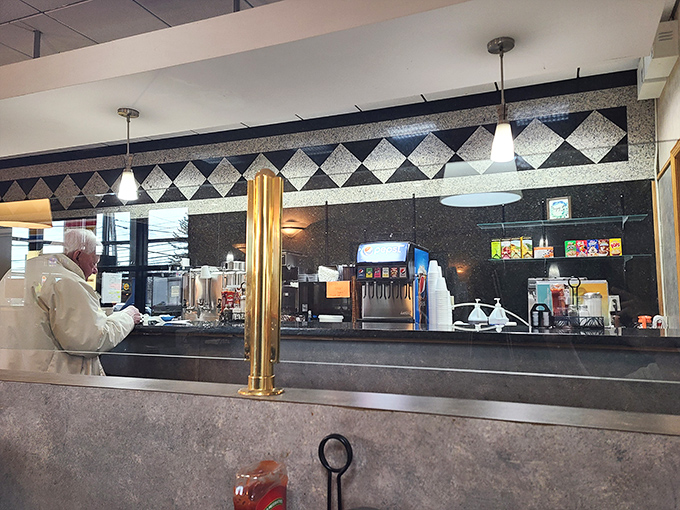 The counter area showcases that classic diner design where coffee flows freely and friendly banter is always on the menu.