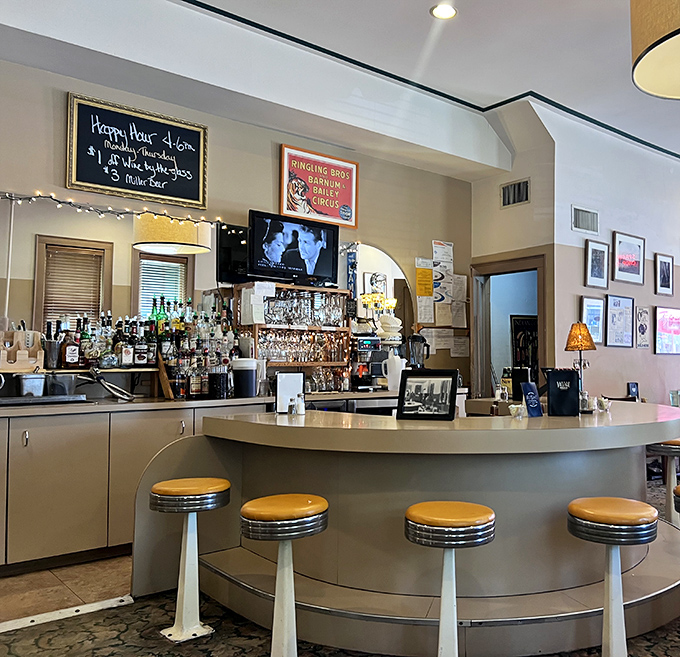 The curved bar invites conversation with strangers who'll become friends by dessert. Those classic stools have heard thousands of "mmms" over the years.