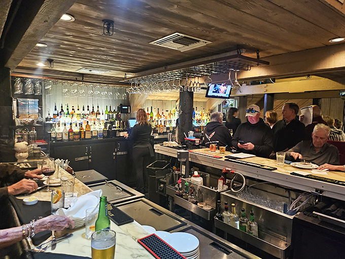 The bar buzzes with anticipation&mdash;each bottle a promise, each bartender a curator of coastal conviviality.