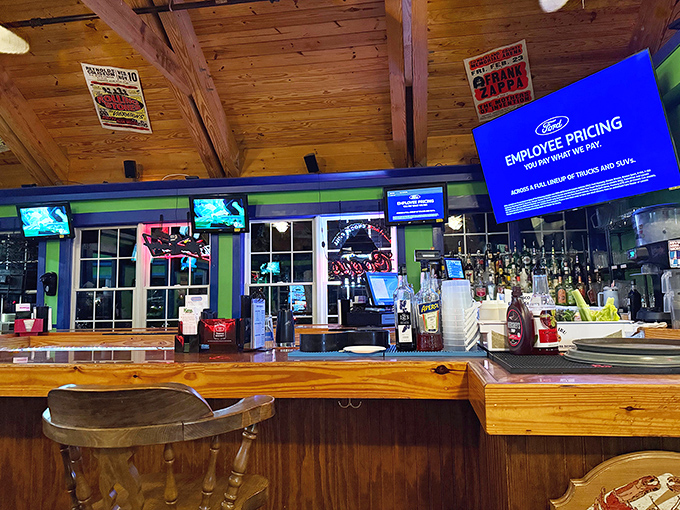 The bar area combines rustic charm with modern convenience &ndash; cold drinks and warm atmosphere under those beautiful wooden beams.
