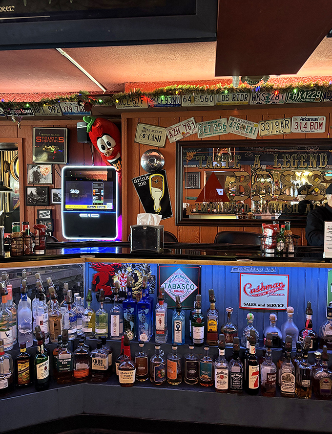 The bar at Grumpy's isn't just stocked &ndash; it's a liquid library of possibilities with license plates that tell stories of road trips past.