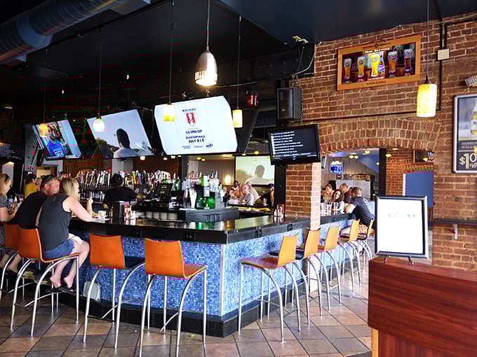 The bar's blue mosaic tiles shimmer like ocean waves, making your beer taste like it was brewed with mermaid tears.