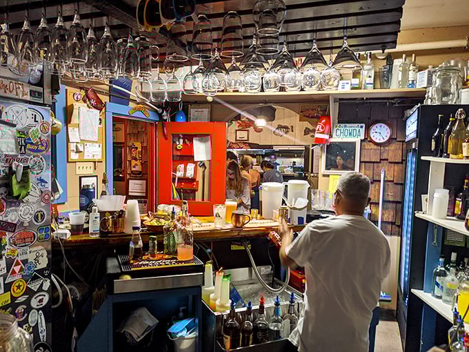 A bar that feels like it has stories to tell. Those glasses hanging overhead have witnessed countless toasts to special occasions and everyday victories.