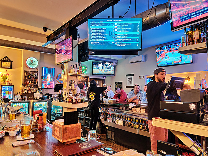 The well-stocked bar is command central for game days, where bartenders orchestrate the perfect balance of drinks, food, and sports.
