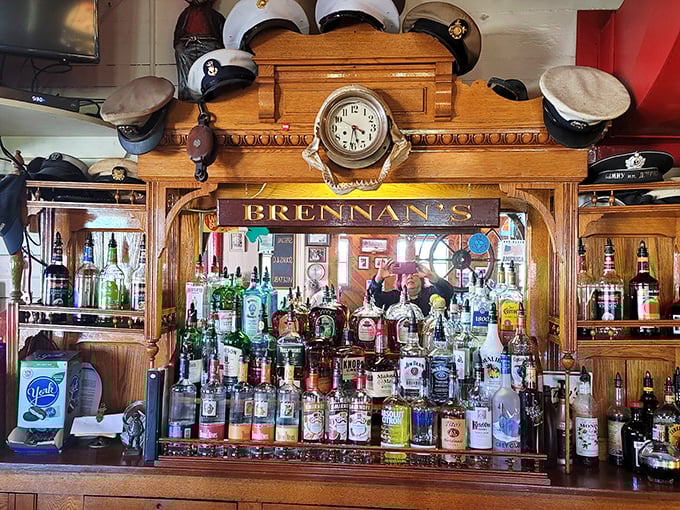 Behind this wooden bar, adorned with nautical caps and timeless charm, bartenders serve up stories alongside spirits in true Great Lakes tradition.