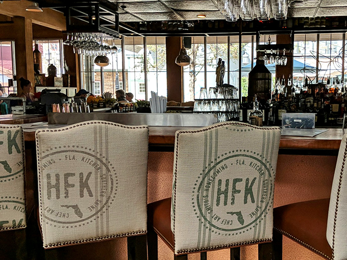 The bar stools aren't just comfortable&mdash;they're front-row seats to the mixology magic that turns Florida moonshine into sophisticated Southern cocktails.