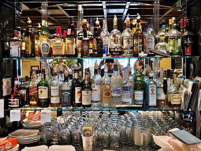 A bar stocked for serious business. The impressive array of spirits stands ready to transform any ordinary meal into a celebration.