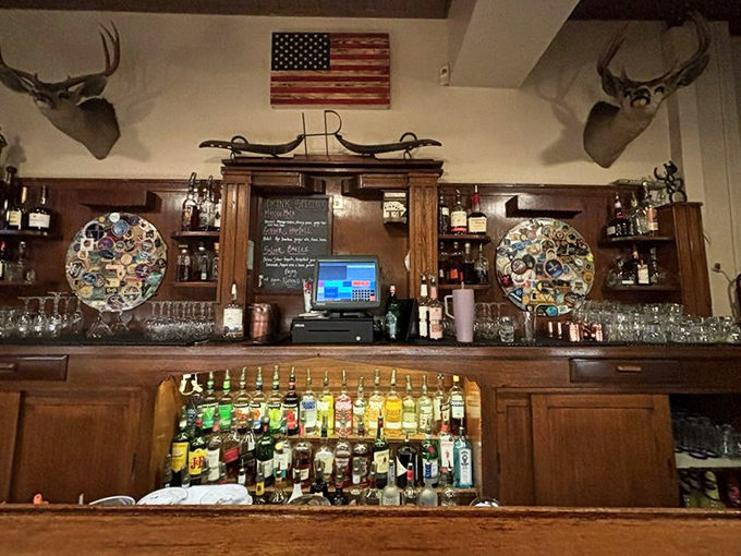 Behind the bar, where deer heads and American flags set the tone, bartenders craft the perfect prelude to your carnivorous adventure.