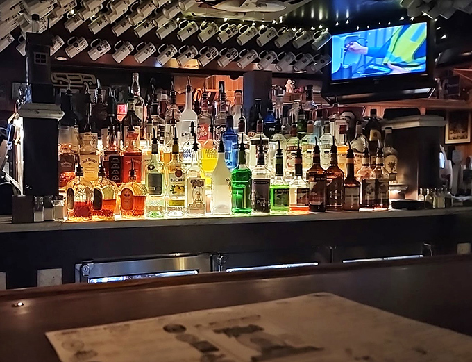 The well-stocked bar glows with amber bottles&mdash;liquid treasures waiting to complement your burger adventure.