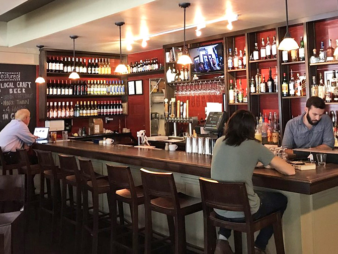 A proper bar area with an impressive selection, because great burgers deserve equally great beverage companions nearby.