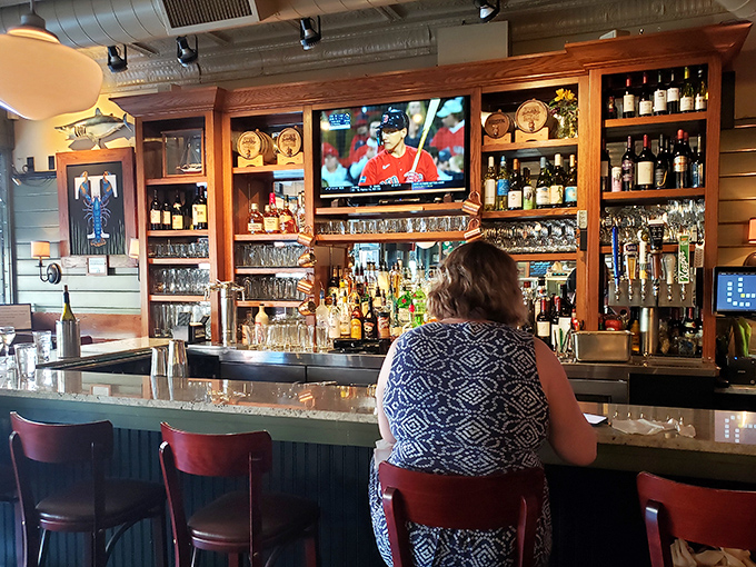 A well-stocked bar with plenty of seating means your wait for a table comes with excellent liquid entertainment options.
