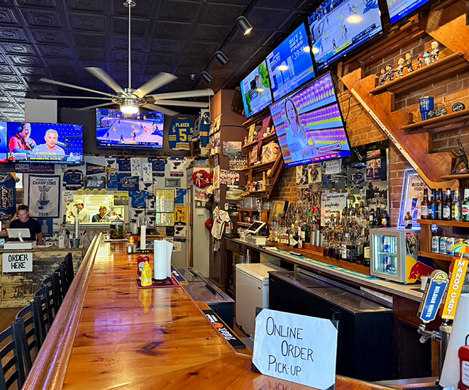 The bar area doesn't just serve drinks&mdash;it serves community, with memorabilia-lined walls telling stories while bartenders craft liquid companions for legendary sandwiches.