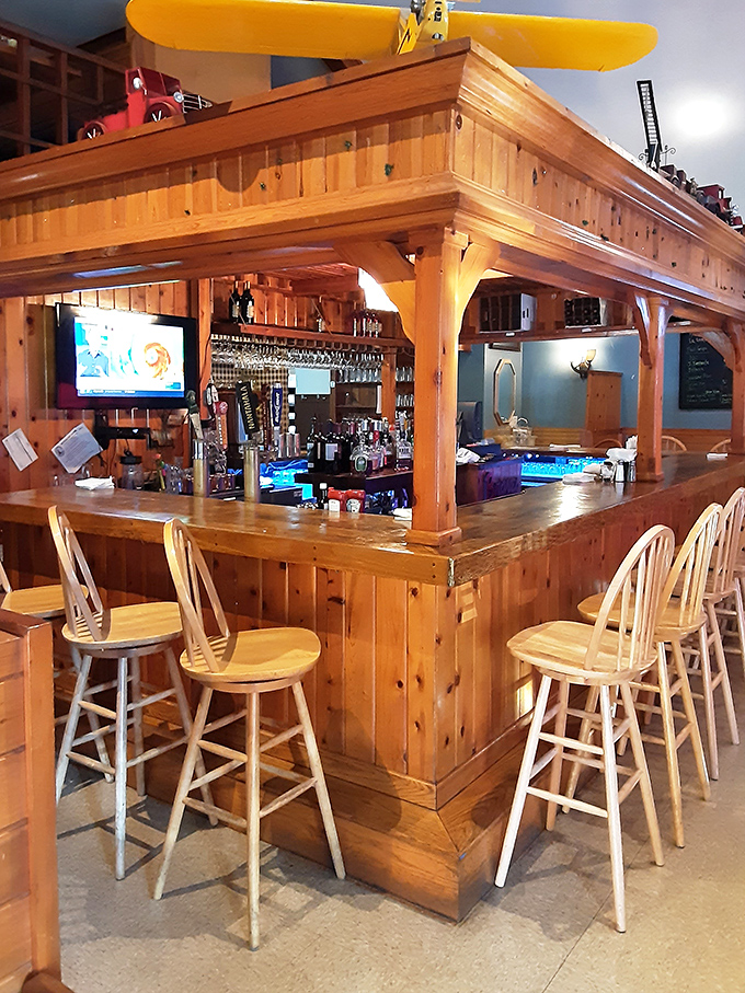 The bar area where locals gather and visitors become regulars after just one perfectly mixed old fashioned.