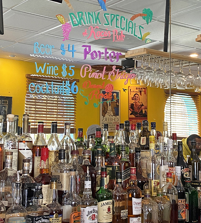 The bar's colorful drink specials board looks like it was designed by someone who understands joy is a legitimate business strategy.