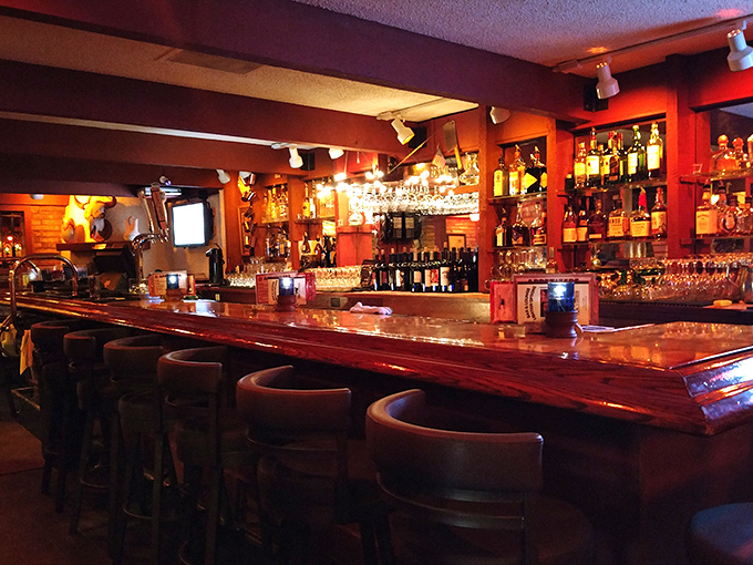 A bar stocked for serious business&mdash;because sometimes the perfect Manhattan is the ideal prelude to a perfect steak.