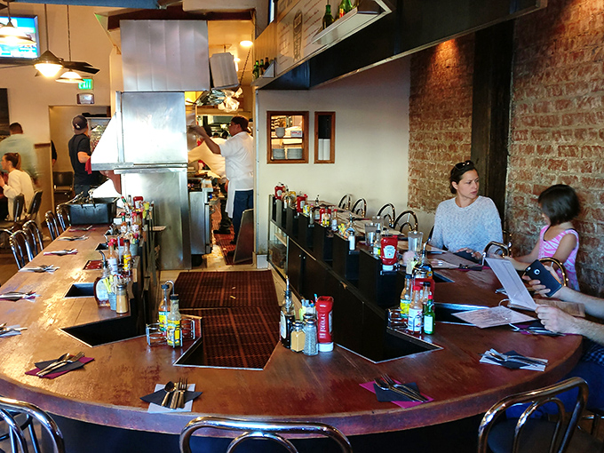 The bar seating offers prime real estate for breakfast voyeurs who appreciate the art of griddle choreography up close.