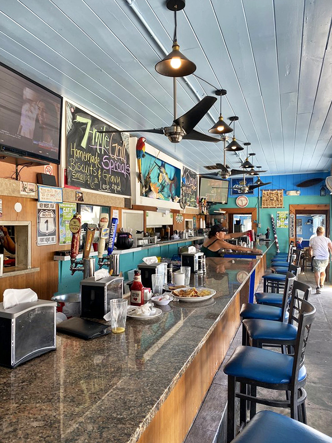 The bar area serves up coastal charm by the gallon, with blue ceilings that mirror the Marathon sky.