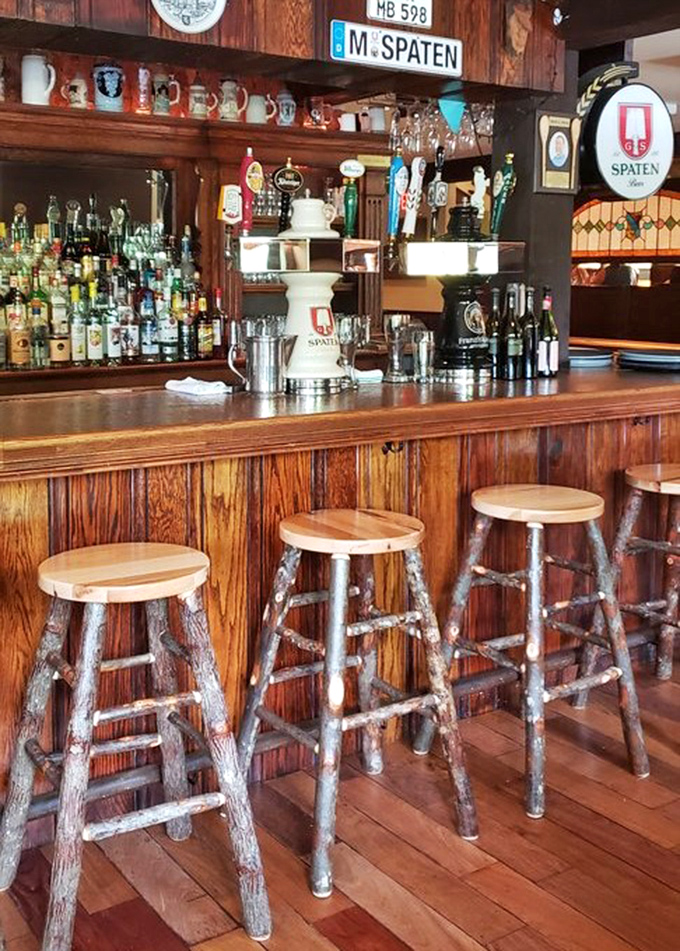 The bar area doesn't just serve drinks; it serves atmosphere. Those steins lining the shelves have seen some stories worth telling.