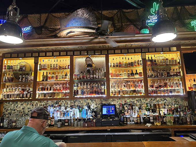 The bourbon bar glows like amber treasure, promising liquid comfort after a long day. That impressive collection would make even a Kentucky colonel nod in approval.