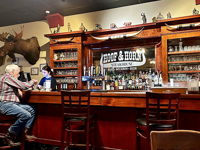 The bar stands ready like a trusty sidekick, offering liquid courage for those attempting the full portion.