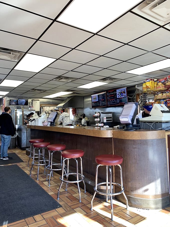 The counter stools&mdash;each one a front-row seat to culinary theater where loose meat sandwiches are the starring attraction.