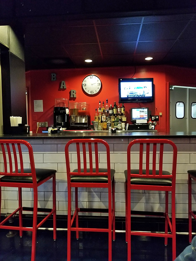 The bar area isn't just for drinks – it's command central for sports watching, friendly conversation, and pre-dinner appetite building.