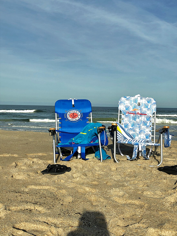 Beach chairs standing at attention like faithful soldiers, ready for duty in the war against indoor boredom.