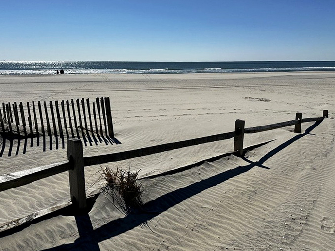 The pristine Margate beach stretches toward the horizon, just steps away from Lucy's enormous feet. Ocean views that never disappoint.