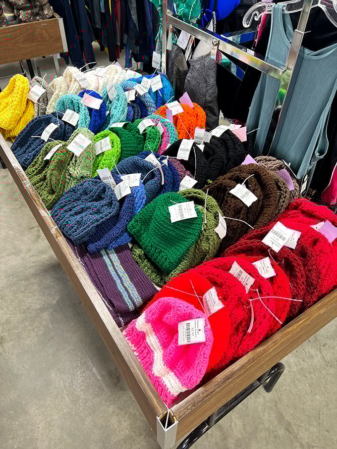 A rainbow of hand-knitted beanies, each with its own personality, ready to keep North Dakota heads warm in style.