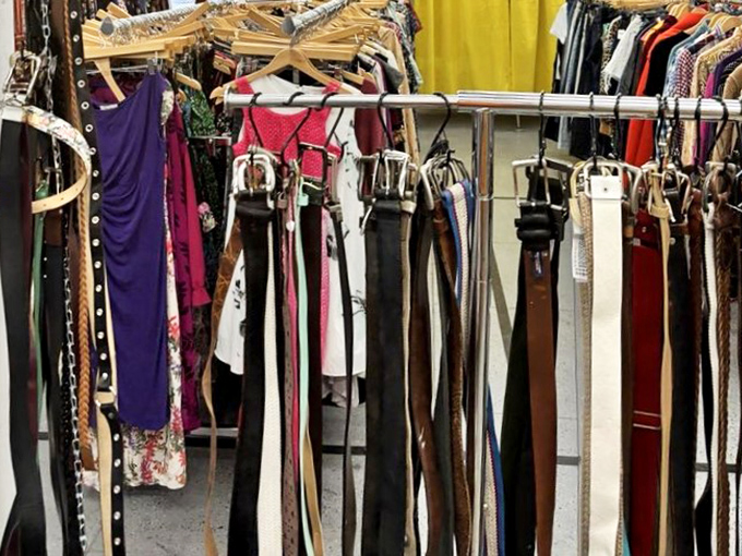 The accessories wall&mdash;where belts of past decades hang like timeline markers of fashion history. That studded one? Pure 80s rock nostalgia.