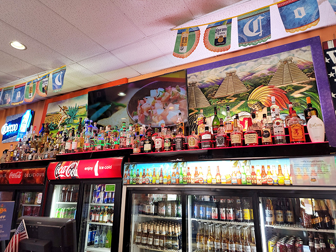 Not just a bar but a shrine to spirits, where tequila bottles stand at attention like soldiers guarding flavor's fortress.