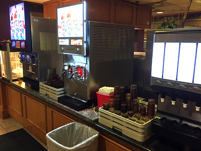 The beverage station stands ready to quench thirsts with endless refills. Hydration is important when you're tackling a buffet of this magnitude.