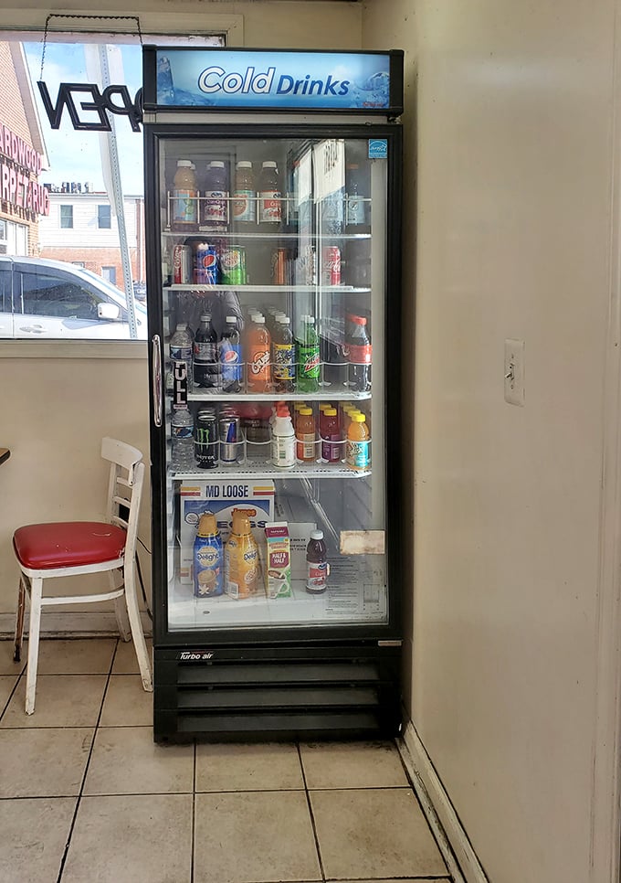 The beverage cooler stands ready with liquid companions for your donut adventure&mdash;because even sweet perfection needs a sidekick.