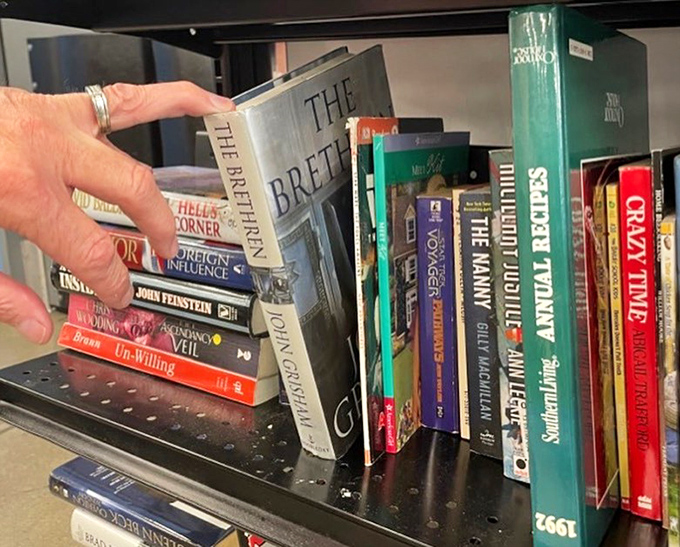 Books stacked and waiting for new readers, each spine holding stories that someone else loved enough to share forward.