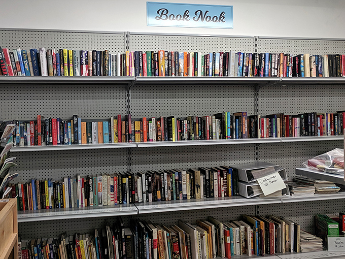 The "Book Nook" offers literary journeys without the bestseller price tag. These well-organized shelves prove that good stories deserve second readings and new audiences.