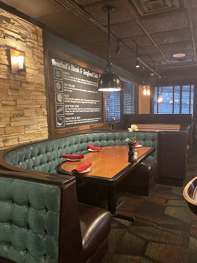 Not just a booth, but a sanctuary. The tufted turquoise upholstery and polished wood create the perfect backdrop for memorable meals.
