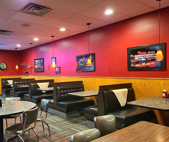 Red walls and wood paneling create that perfect diner atmosphere where time slows down just enough to enjoy another cup of coffee and maybe dessert.