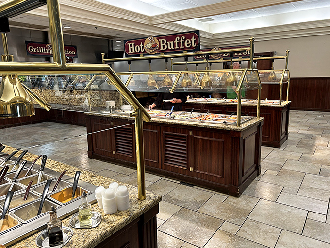 The hot buffet area gleams with brass and promise&mdash;a gastronomic runway where comfort foods strut their stuff under perfect lighting.