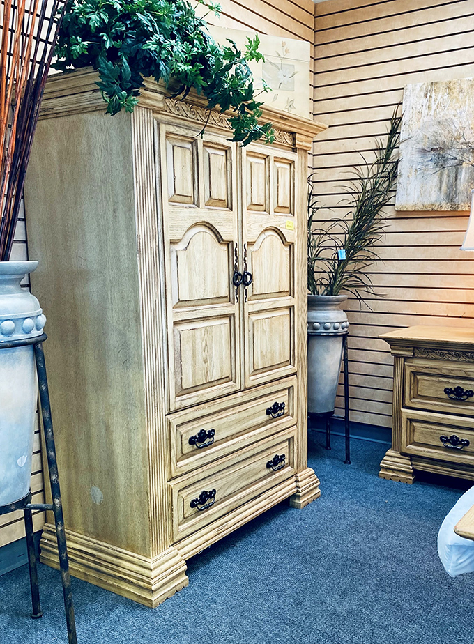 This distressed wood armoire could hide anything from winter sweaters to your secret candy stash with equal elegance.