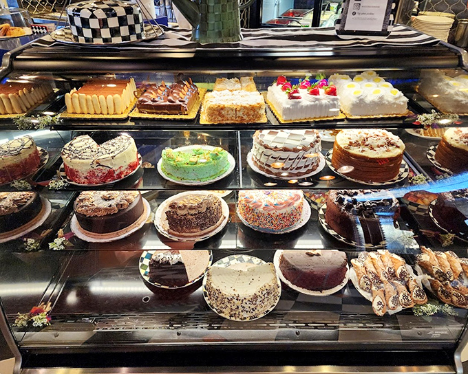 The cake display that launched a thousand diet cheat days. Each one whispers, "You can have salad tomorrow," and they're very persuasive.