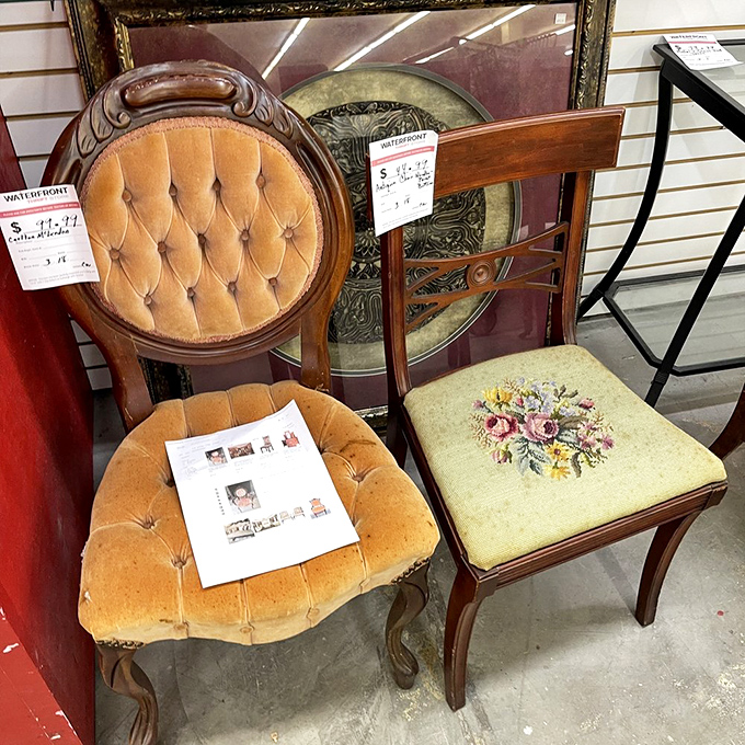 Vintage chairs offer character that IKEA simply can't replicate, complete with needlepoint that screams inherited elegance.