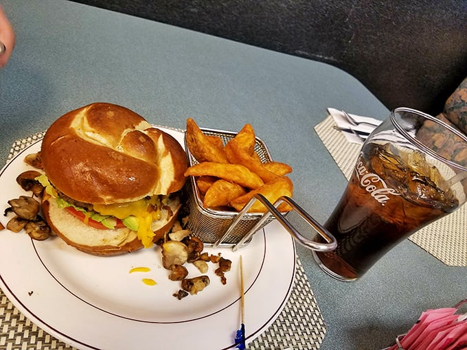 A burger that doesn't need fancy toppings or a clever name&mdash;just quality ingredients and proper execution. The fries in their little basket are just showing off.