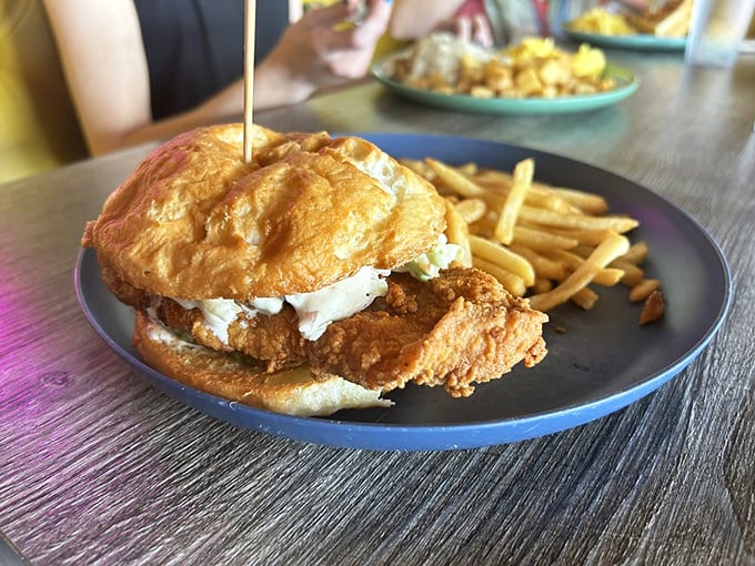 A chicken sandwich that's dressed to impress, with a bun so perfectly toasted it deserves its own fan club.