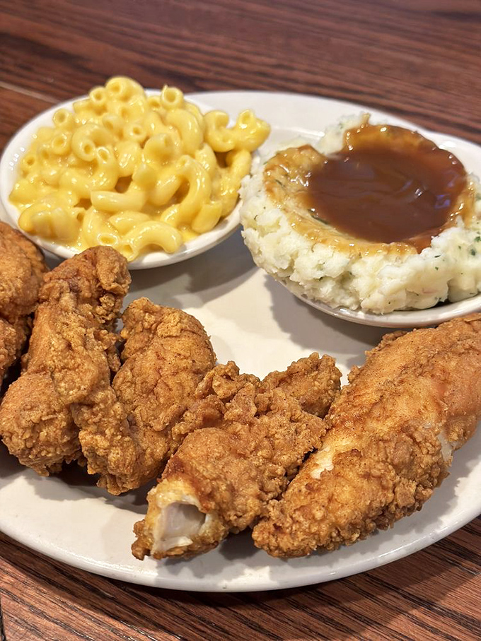 Chicken tenders with that perfect golden-brown exterior, mac and cheese that's actually cheesy, and mashed potatoes with gravy&mdash;comfort food's greatest hits album.