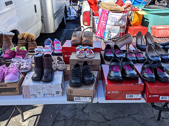 Shoe shopping without the mall prices—tiny sneakers and practical flats waiting to find their Cinderella in this asphalt kingdom.