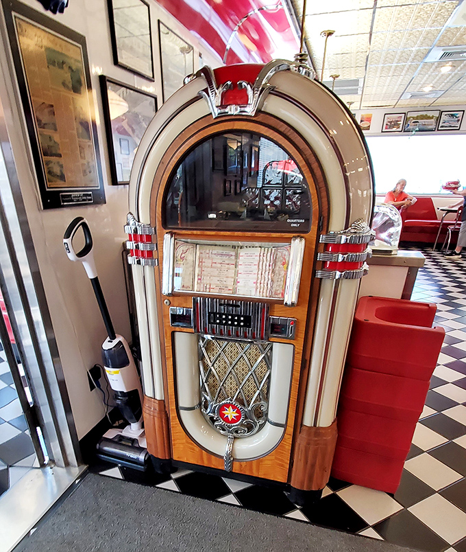 The soundtrack to your meal! This vintage jukebox doesn't just play songs—it time-travels you to an era when rock was young and milkshakes had real ice cream.