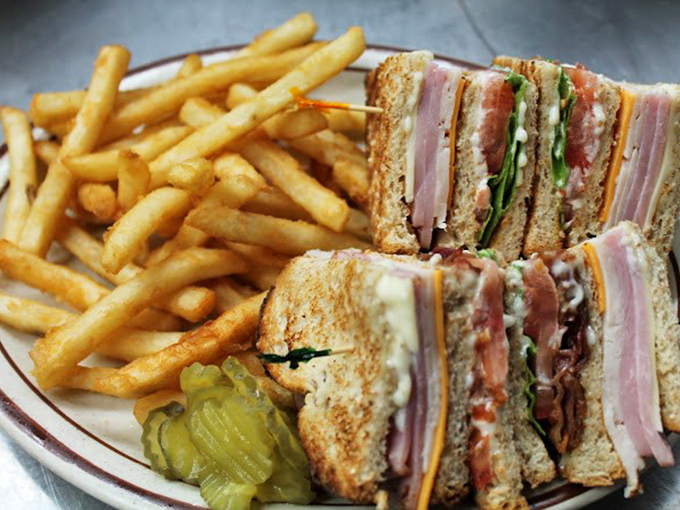 The club sandwich &ndash; mankind's greatest achievement in strategic layering since the invention of winter clothing. Those fries look criminally good.