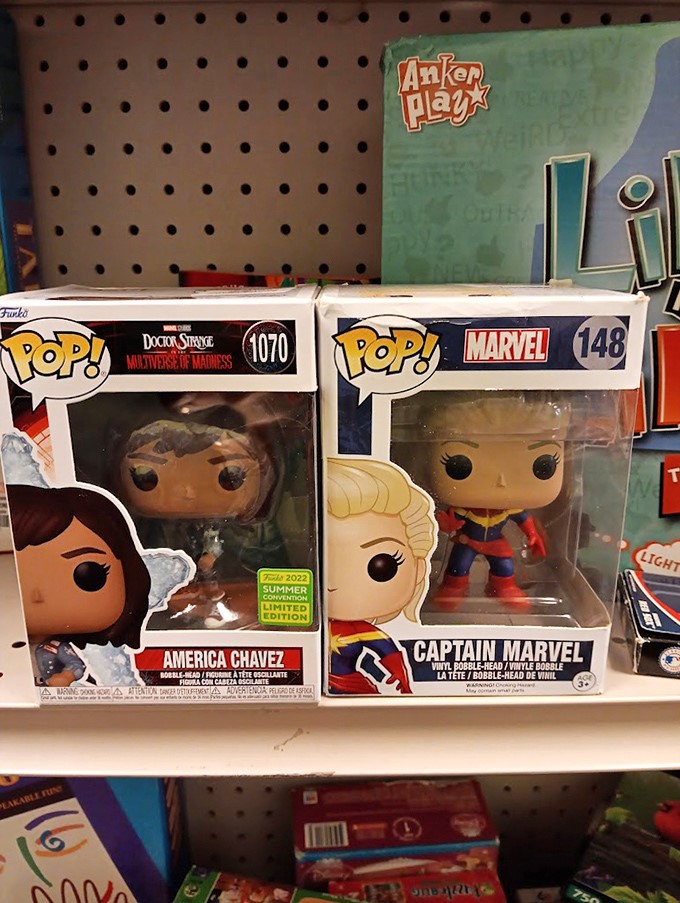 Pop culture collectibles await new homes, with Marvel characters standing guard on the shelves, ready for their next adventure.