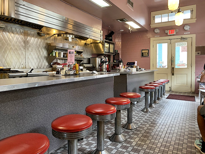 The counter seats offer front-row tickets to the best show in town &ndash; short-order cooks performing culinary ballet on a postage-stamp sized grill.