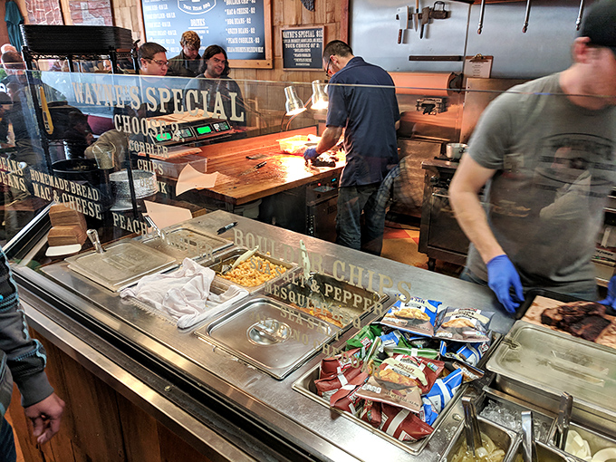 The counter where meat dreams come true. That cutting board has seen more action than an ER on a full moon.